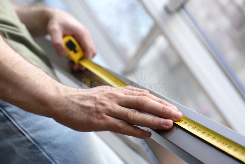 Man Measuring Metal Railing. Construction Tool Stock Image - Image of ...
