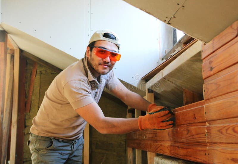 Man Measuring Rail at Home during Construction Stock Photo - Image of ...