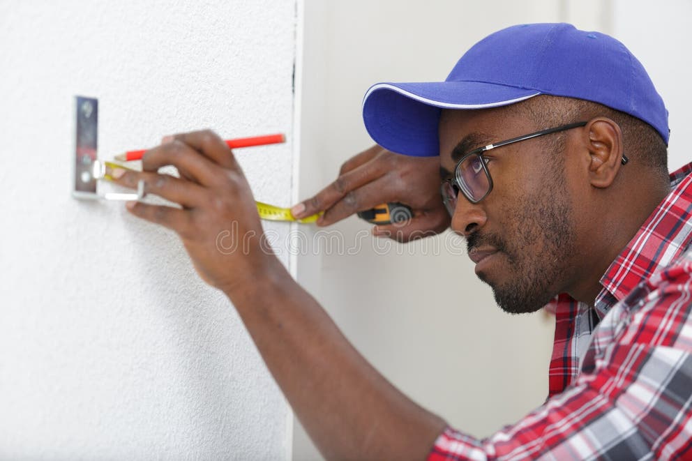 Man Measuring Wall Using Folding Ruler Stock Photo - Image of home ...