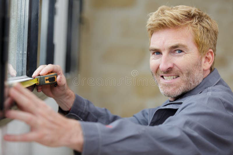 Man measuring window stock image. Image of installation - 197409889 Man measuring window stock image. Image of installation - 197409889