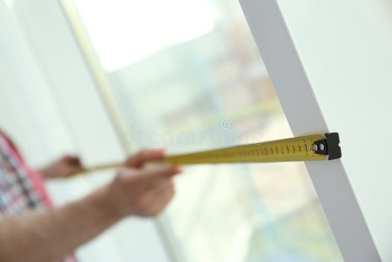 Man Measuring Window, Closeup View Stock Photo - Image of engineering ... Man Measuring Window, Closeup View Stock Photo - Image of engineering ...