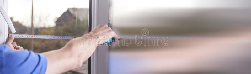 Man Measuring Window. Installing New Window in House Stock Photo ...