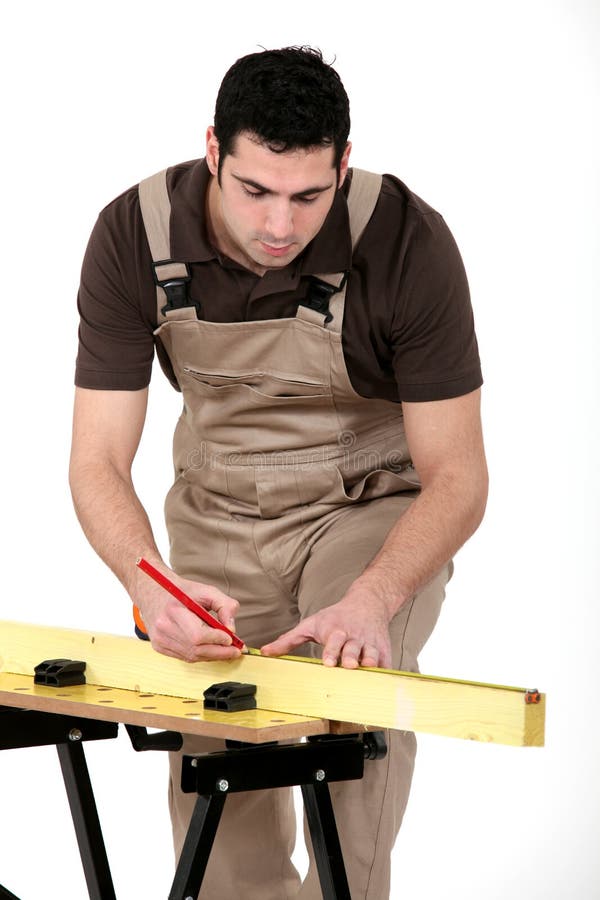 Man measuring wood stock photo. Image of bore, ruler - 29639340