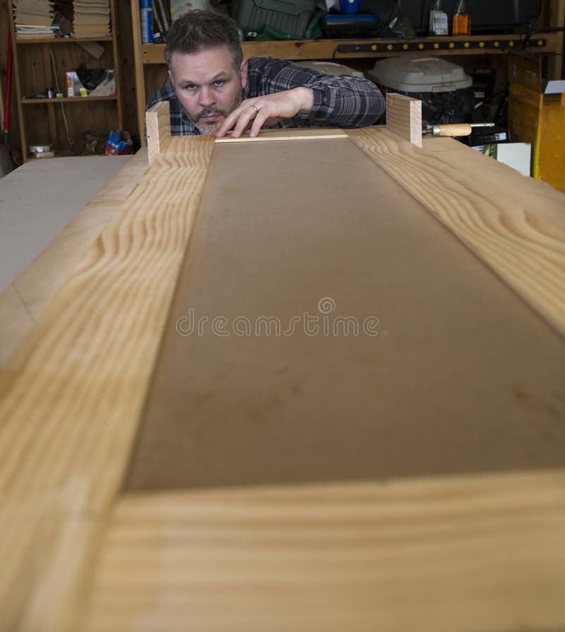 Man Measuring Woodworking Project Stock Image - Image of male, white ...