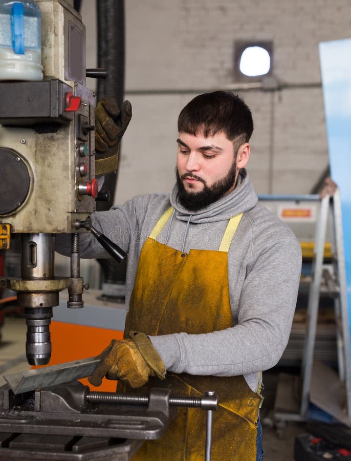 Man Mechanic Using Drilling Machine in Workshop Stock Image - Image of ...