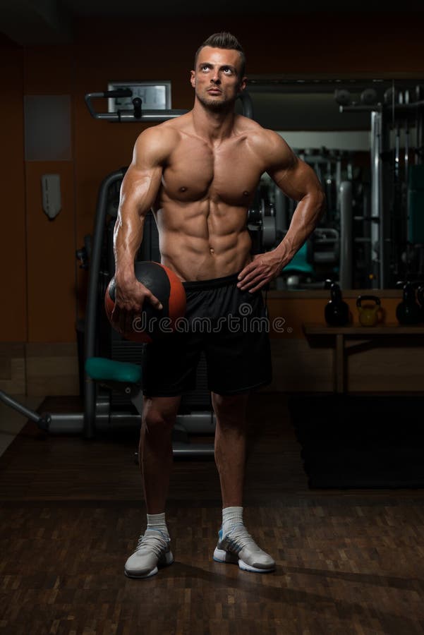 Man and Medical Ball stock image. Image of club, power - 41168179