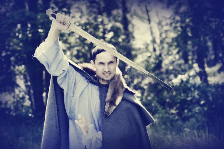 1,082 Young Man Holding Sword Stock Photos - Free & Royalty-Free Stock ...