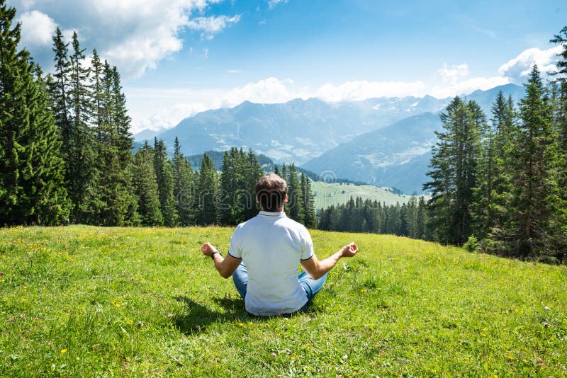 Man Doing Meditation in Mountains Stock Photo - Image of calm, journey ...