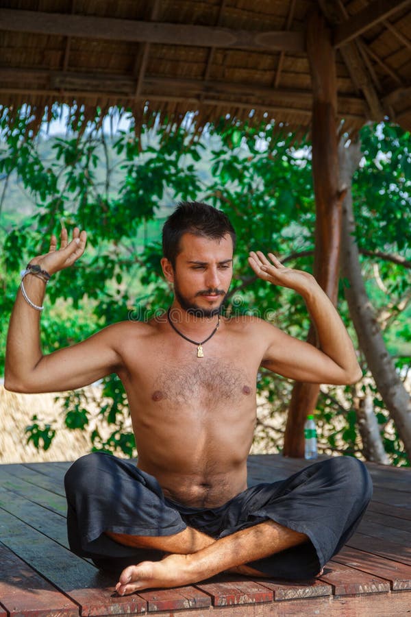 Man in meditation stock photo. Image of health, brunette - 77982658