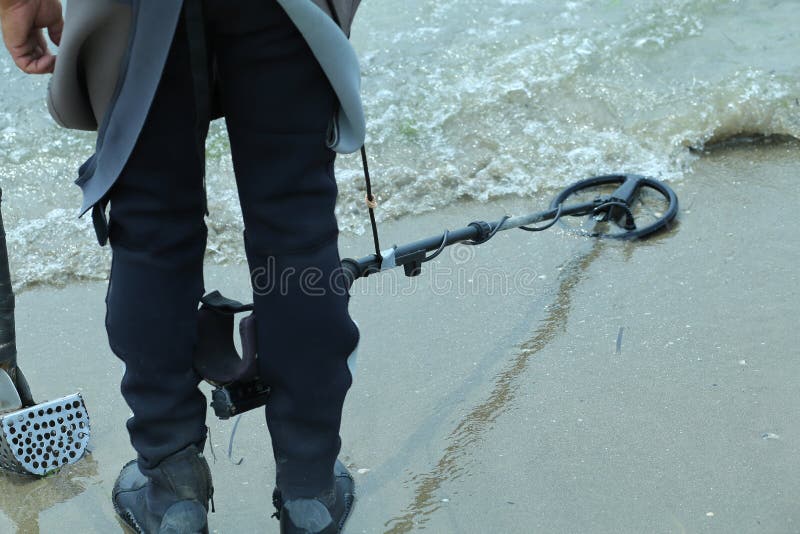 Man with Metal Detector on the Beach To Find Lost Objects Stock Image ...