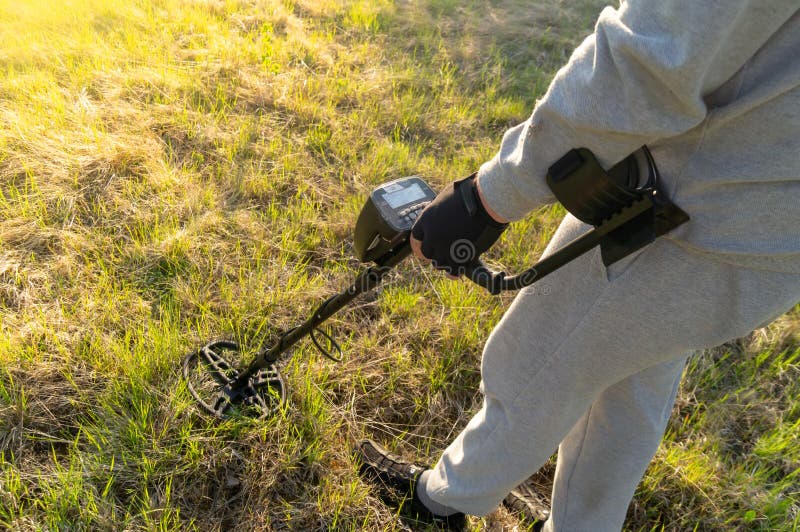 Man with Metal Detector Looking for a Treasure Stock Photo - Image of ...