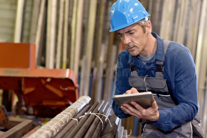 Man in Metal Industry Working with Tablet Stock Photo - Image of ...