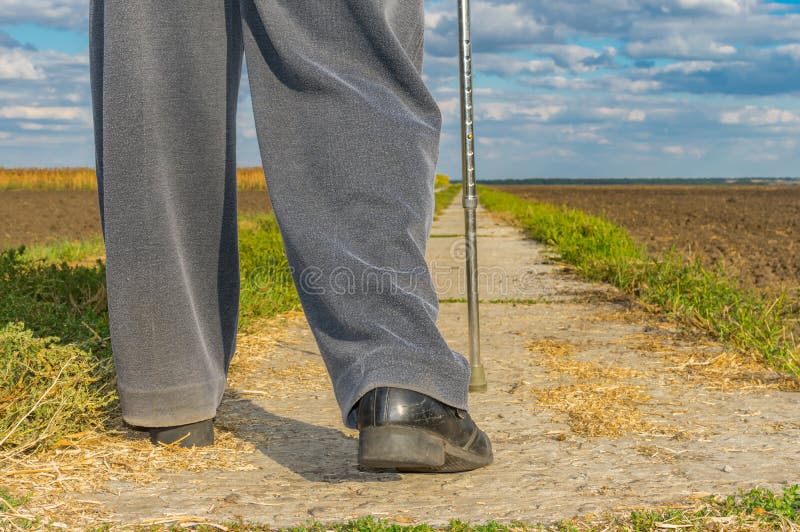 Man Metal Walking Stick Doing Hard Step Outdoor Stock Photos - Free ...