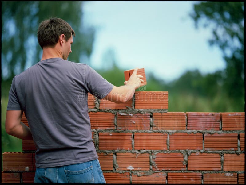 Builder Laying Bricks on an Outdoor Wall Stock Photo - Illustration of ...