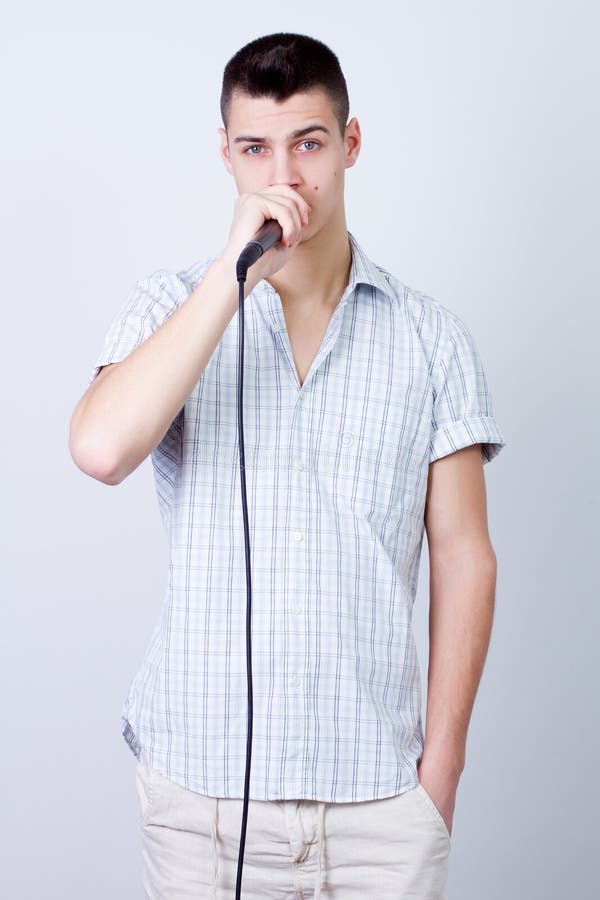 Holding Microphone stock image. Image of music, lead, singer - 231955
