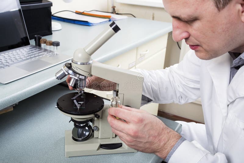 Man Microscope Drips Oil Drop Pipette Stock Photos - Free & Royalty ...