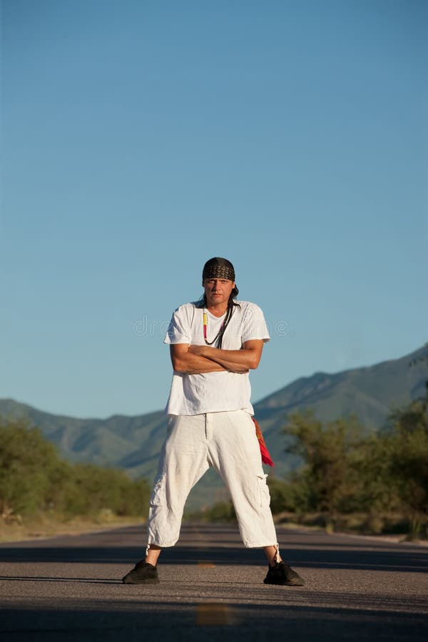 Man in the Middle of a Road Stock Image - Image of road, person: 16254693