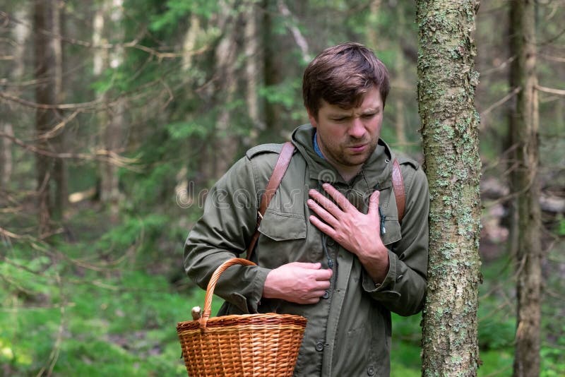 Man Might Have a Heart Attack while Walking at Forest. Stock Image ...