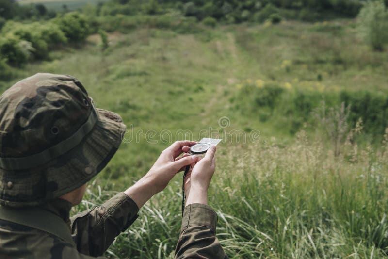 Man in Military Outfit Using a Compass Stock Image - Image of azimuth ...