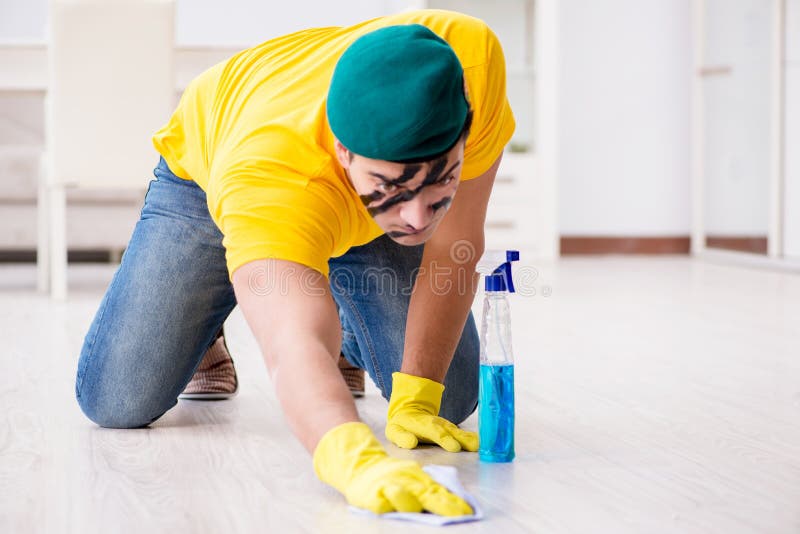The Man in Military Style Cleaning the House Stock Image - Image of ...