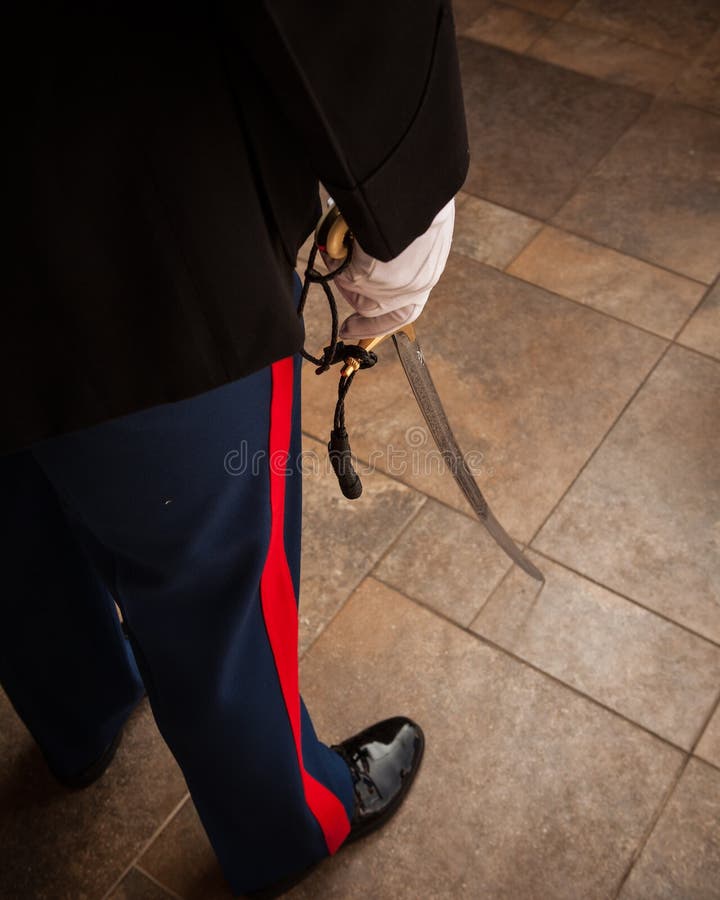 Man in Military Uniform with Sword Showing Lower Half of Body only ...