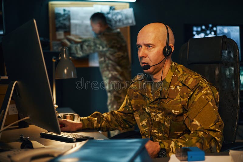 Working in Military Office with Headset on Stock Image - Image of ...