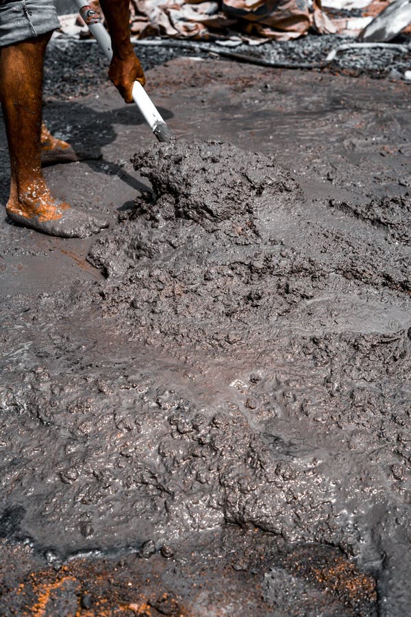 Man Mixing Concrete with Shovel on the Floor by Hand Stock Image ...