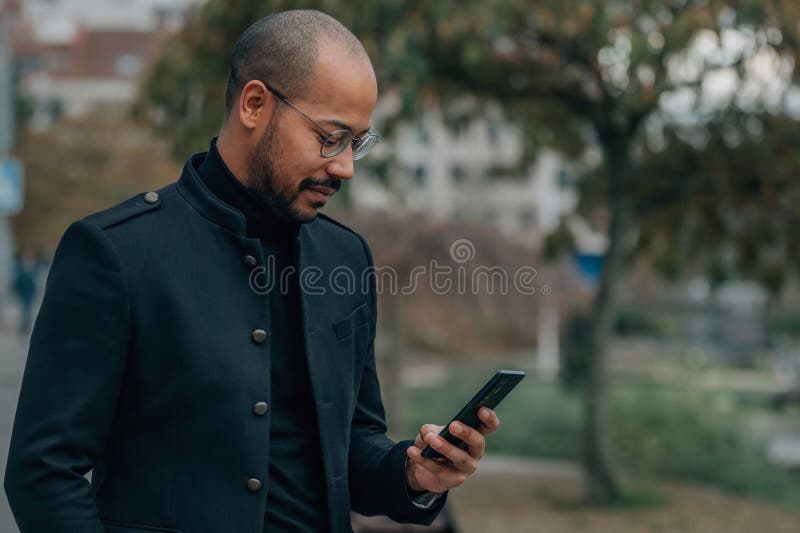 Man Pointing at Mobile or Cell Phone Stock Image - Image of cellular ...