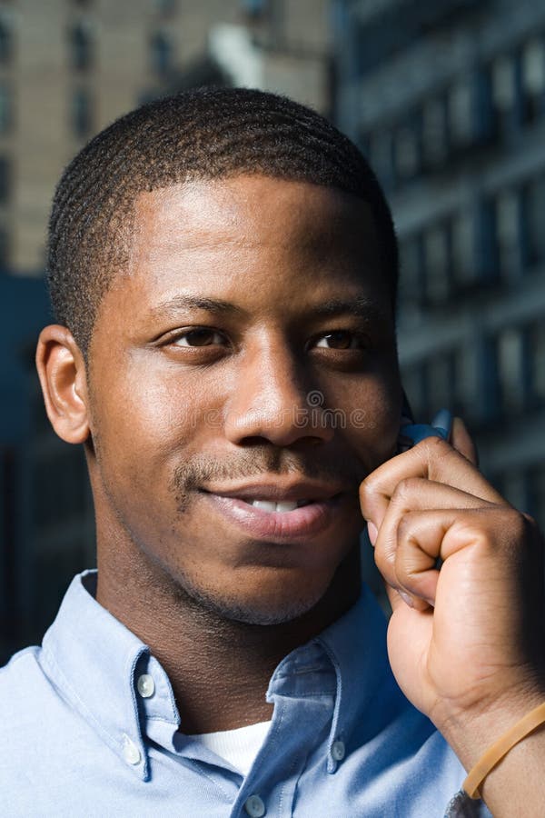 Man on mobile phone stock photo. Image of collar, building - 62558062