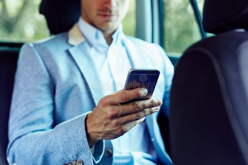 Man with Mobile Phone in Hand Sitting in the Car Stock Image - Image of ...
