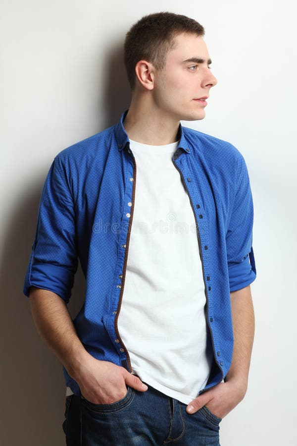 Man stock photo. Image of shirt, white, blue, standing - 83581580