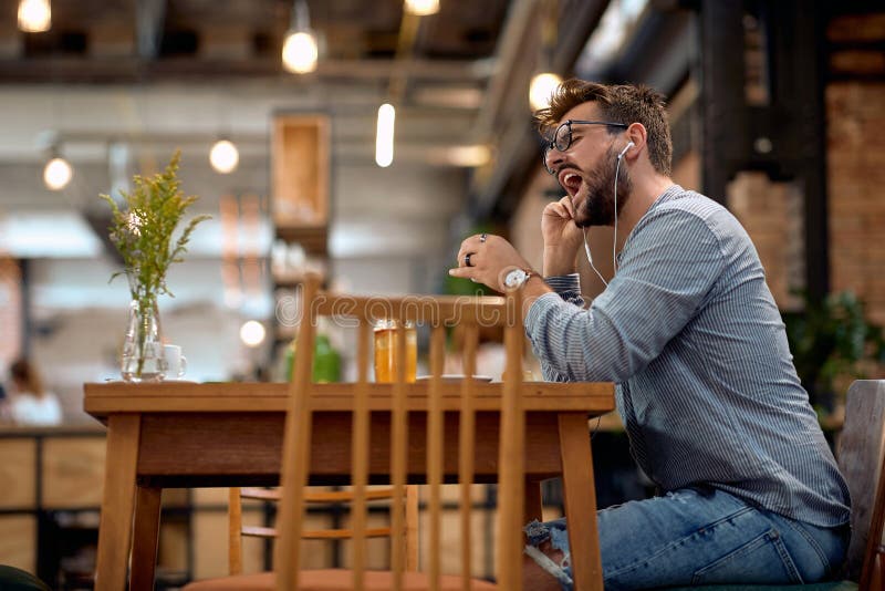 Man in the Moment Enjoy Music and Drinking Coffee Stock Photo - Image ...