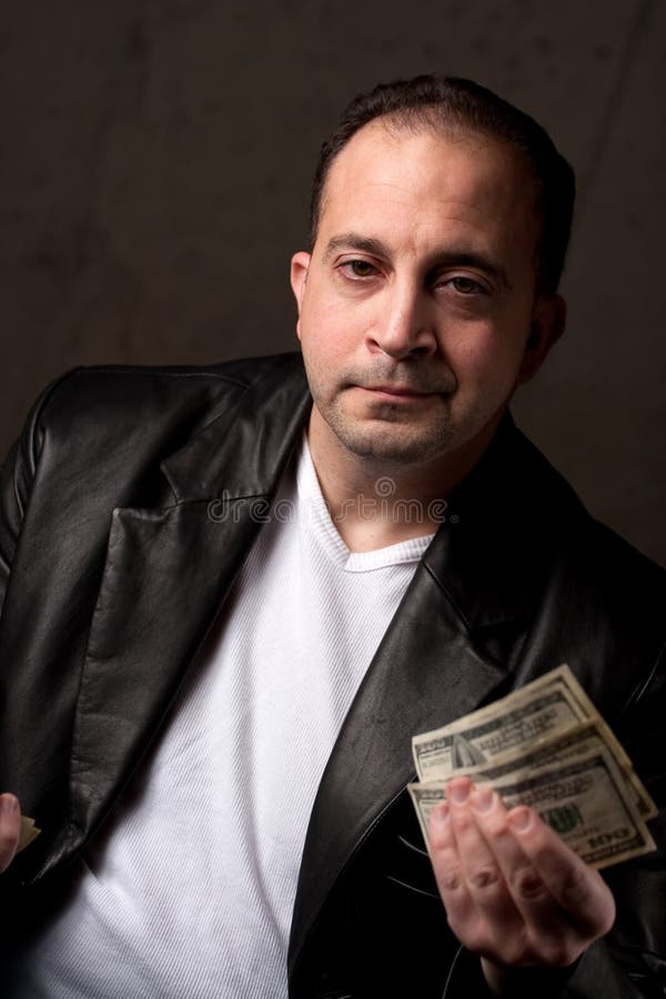 Man with Money stock photo. Image of illegal, earnings - 14255572
