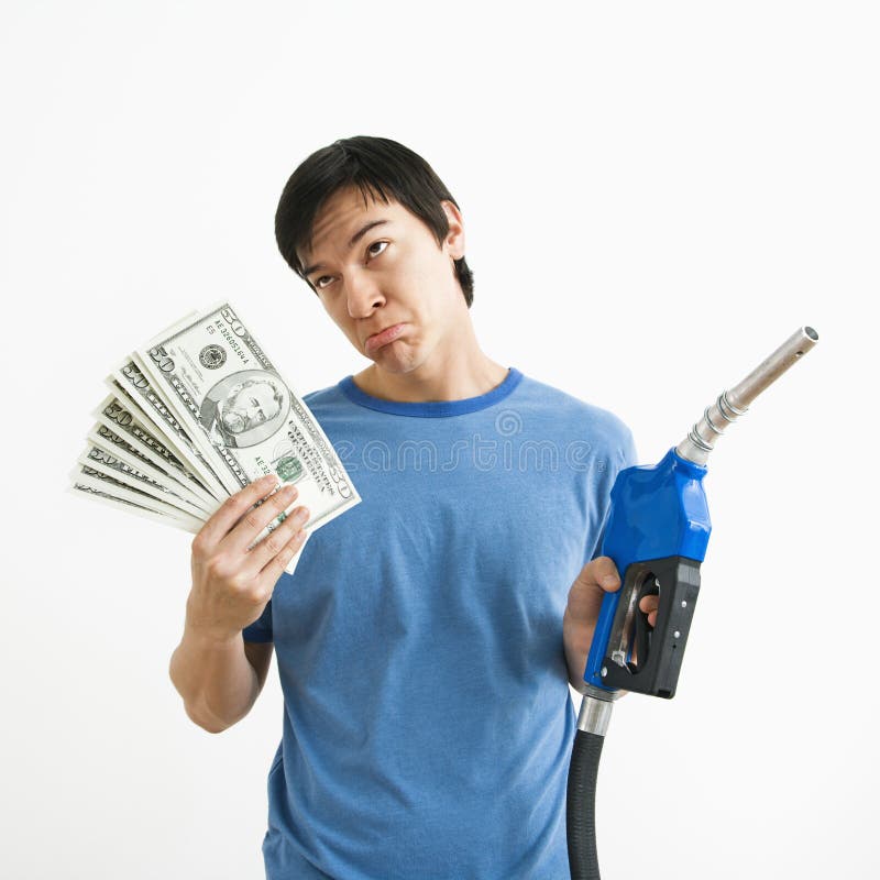 Man with Money and Gas Nozzle. Stock Image - Image of face, adult: 6152861