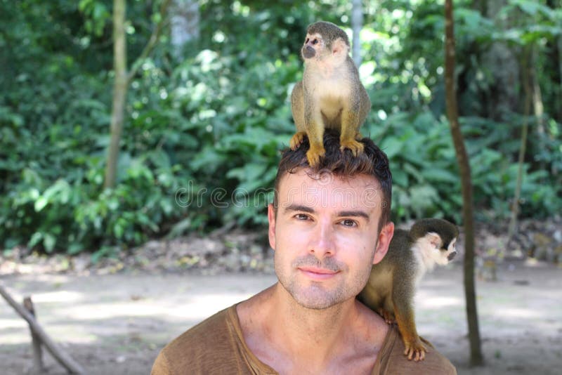 Man with Monkey Sitting on His Head Stock Image - Image of animal, head ...