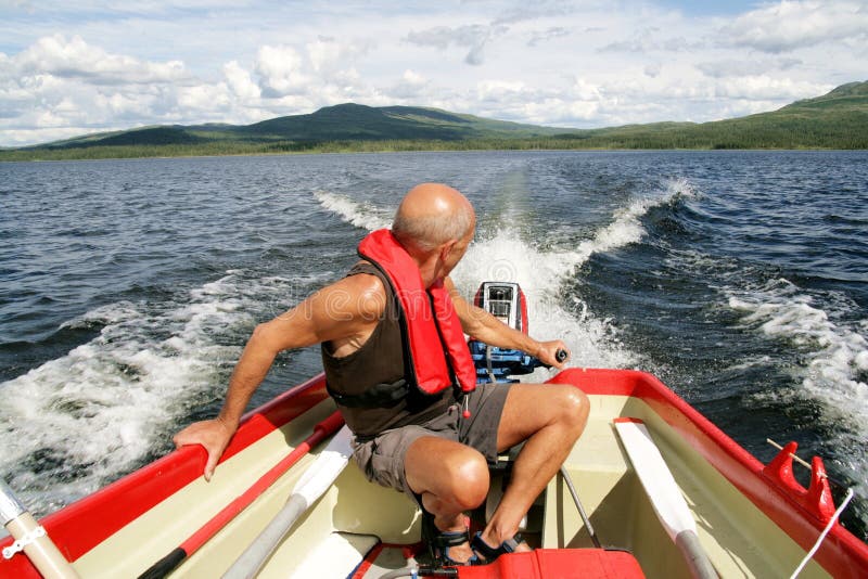 Man in a motor boat stock image. Image of motorboat, west - 20264913