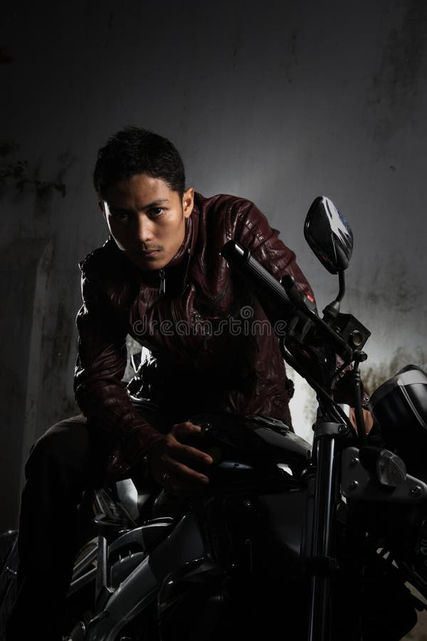 Man and motorcycle stock image. Image of portrait, wearing - 11039747