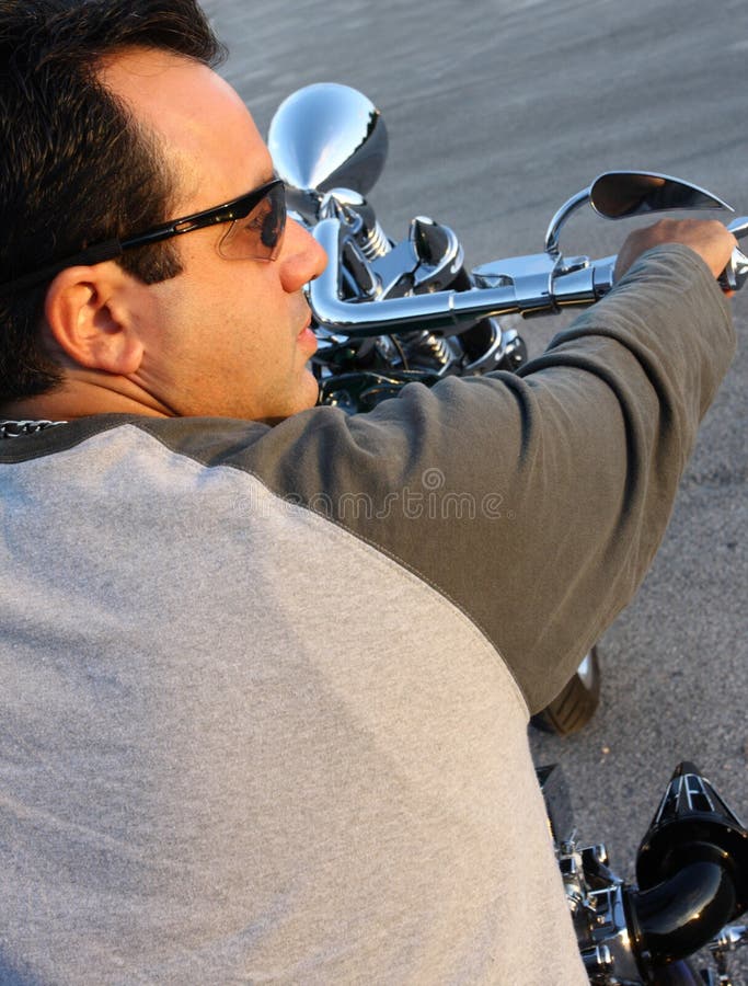 Man on a motorcycle stock image. Image of handlebars, grab - 6375291