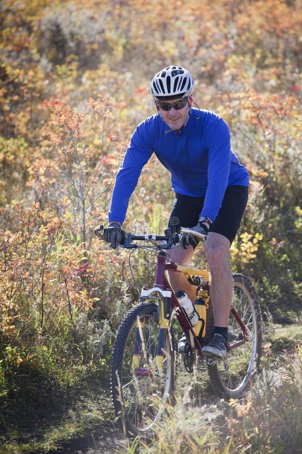 Man mountain biking stock photo. Image of cycling, outdoors - 16610114