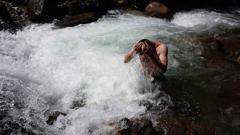 The Man in the Mountain Stream. Stock Image - Image of spring, bathing ...