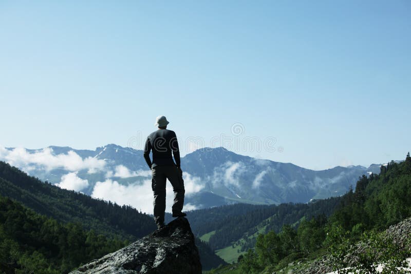 Man in the mountains stock image. Image of leisure, climbing - 10188099