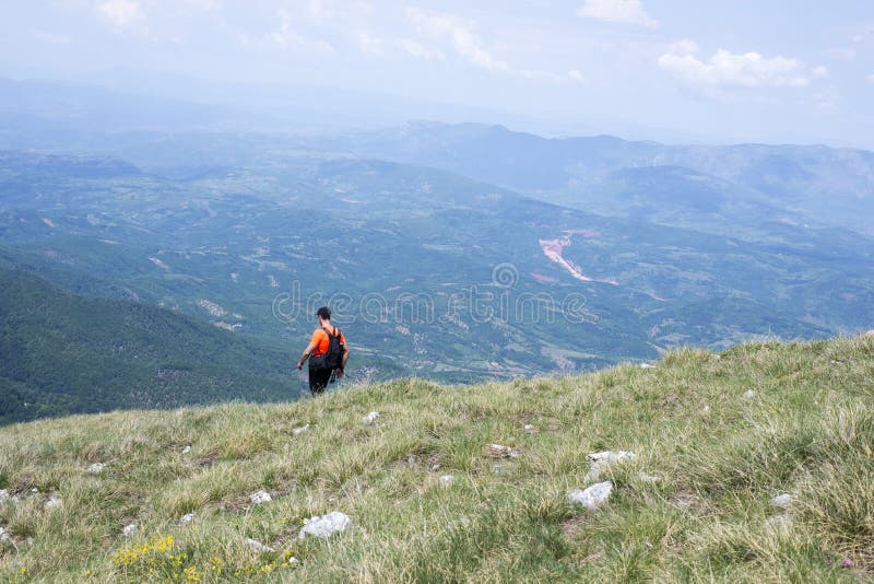 Man on the mountains ridge stock photo. Image of recreation - 133173862