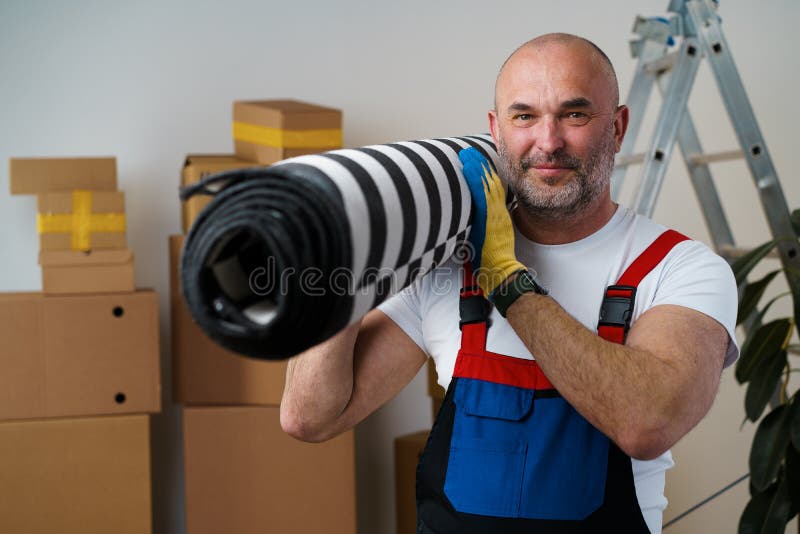 Man Carrying Rolled Carpet Stock Photos - Free & Royalty-Free Stock ...