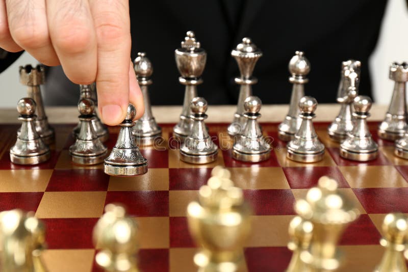 Man Moving Chess Piece on Board, Closeup Stock Photo - Image of ...
