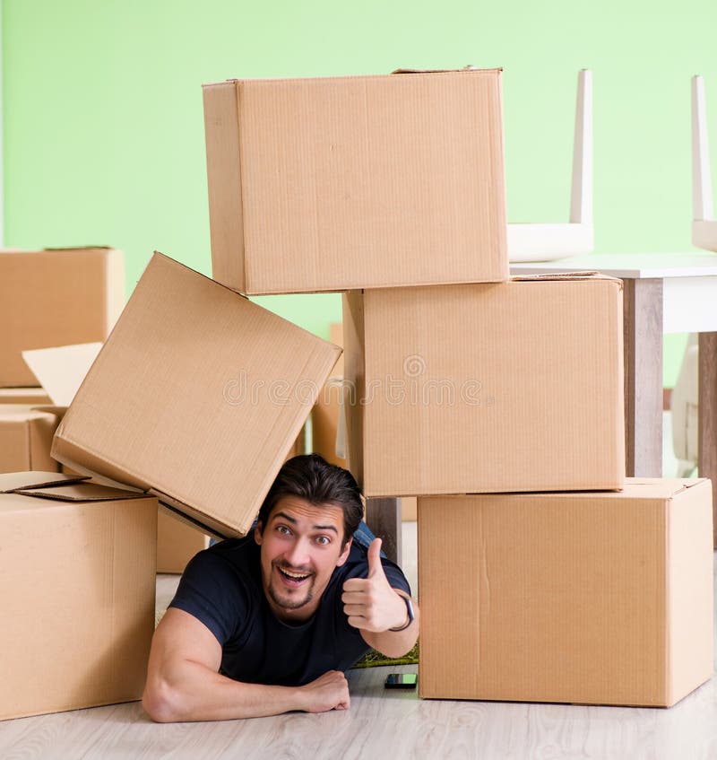 Man Moving House with Boxes Stock Photo - Image of movers, boxes: 218878844