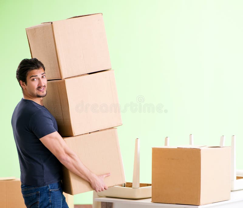 Man Moving House with Boxes Stock Photo - Image of boxes, contractor ...