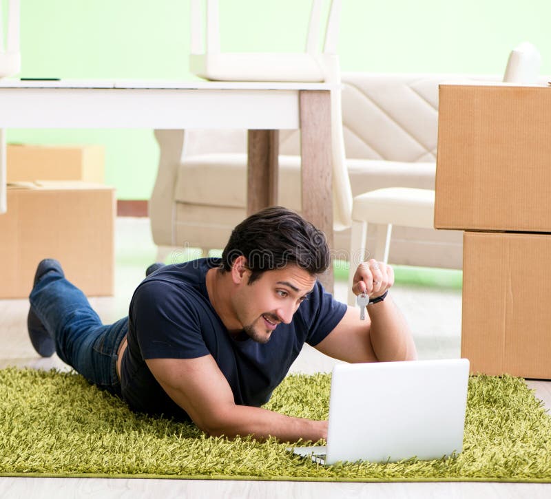 Man Moving House with Boxes Stock Photo - Image of house, package ...