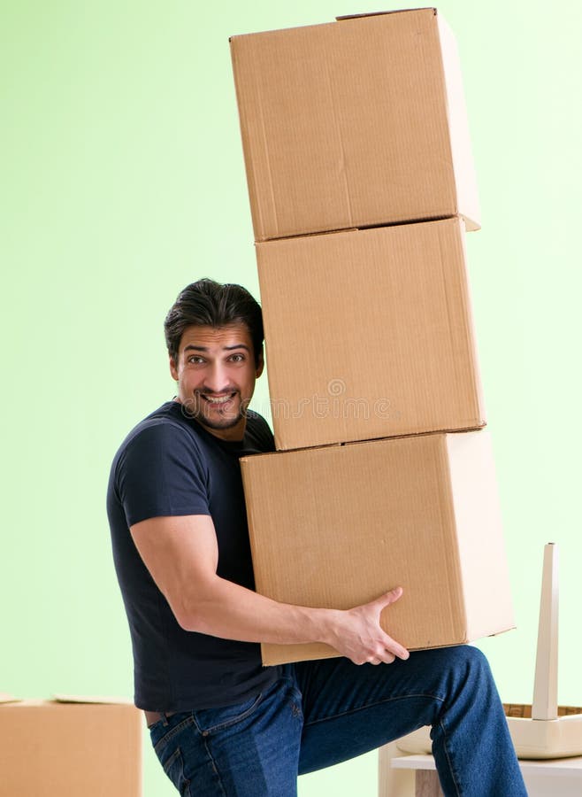 Man Moving House with Boxes Stock Photo - Image of fragile, brown ...