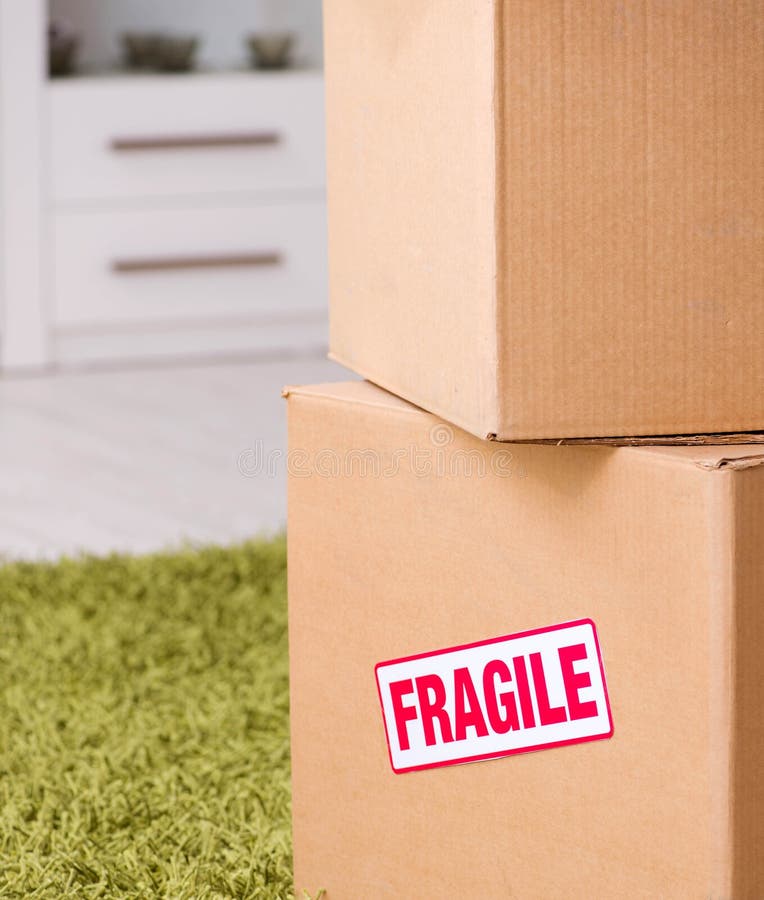 Man Moving House and Relocating with Fragile Items Stock Photo - Image ...