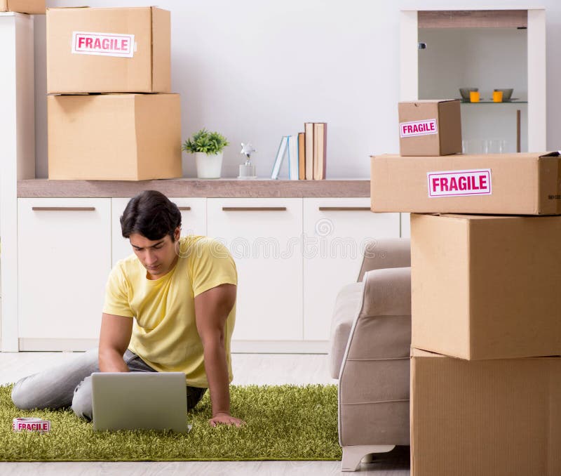 Man Moving House and Relocating with Fragile Items Stock Photo - Image ...
